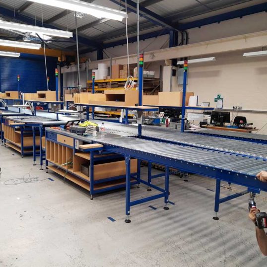 Dispatch Area Driven Roller Conveyor & Packing Stations - Spaceguard